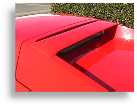 de Tomaso Pantera for sale,red with a delta wing and huge pipesFord